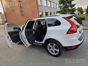White Volvo XC60 2009 in Jekabpils, with an engine capacity of 2.40 L and mileage of 312 thousand km for 7890 €, photo 16 on AUTOMOTO.COM.LV