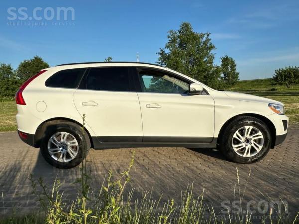 White Volvo XC60 2010 in Ogre, with an engine capacity of 2.00 L and mileage of 331 thousand km for 4990 €, photo 10 on AUTOMOTO.COM.LV