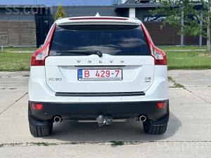 White Volvo XC60 2010 in Riga, with an engine capacity of 2.40 L and mileage of 330 thousand km for 7599 €, photo 8 on AUTOMOTO.COM.LV