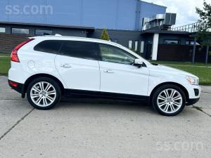 White Volvo XC60 2010 in Riga, with an engine capacity of 2.40 L and mileage of 330 thousand km for 7599 €, photo 12 on AUTOMOTO.COM.LV