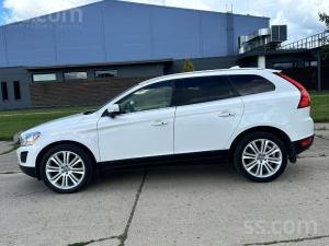 White Volvo XC60 2010 in Riga, with an engine capacity of 2.40 L and mileage of 330 thousand km for 7599 €, photo 14 on AUTOMOTO.COM.LV