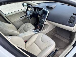 White Volvo XC60 2010 in Riga, with an engine capacity of 2.40 L and mileage of 330 thousand km for 7599 €, photo 31 on AUTOMOTO.COM.LV