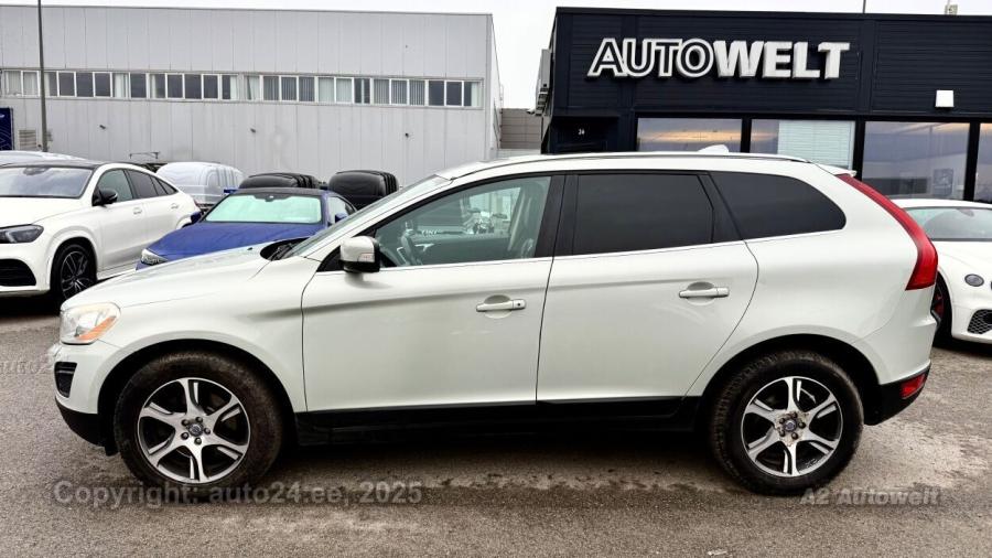 White Volvo XC60 2011 in Tallinn, with an engine capacity of 2.40 L and mileage of 314 thousand km for 6990 €, photo 4 on AUTOMOTO.COM.LV