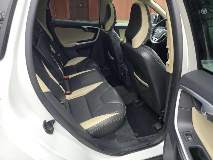 White Volvo XC60 2011 in Prienai, with an engine capacity of 2.00 L and mileage of 317 thousand km for 7500 €, photo 13 on AUTOMOTO.COM.LV