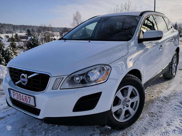 White Volvo XC60 2011 in Trakai, with an engine capacity of 2.40 L and mileage of 330 thousand km for 7190 €, photo 6 on AUTOMOTO.COM.LV
