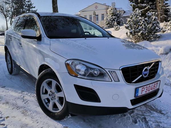 White Volvo XC60 2011 in Trakai, with an engine capacity of 2.40 L and mileage of 330 thousand km for 7190 €, photo 7 on AUTOMOTO.COM.LV