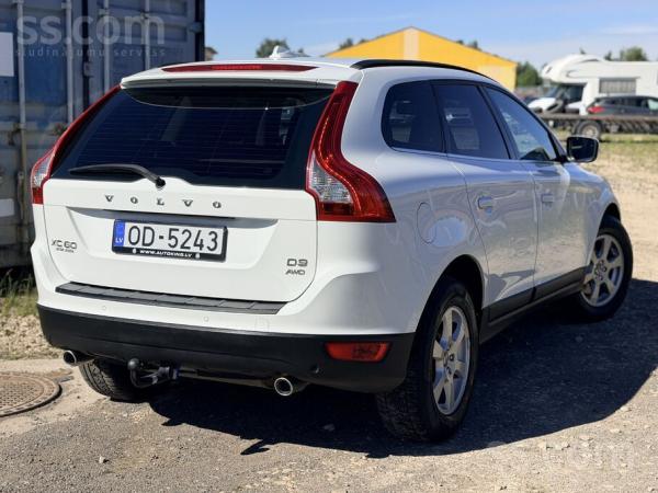White Volvo XC60 2011 in Riga, with an engine capacity of 2.40 L and mileage of 298 thousand km for 9995 €, photo 4 on AUTOMOTO.COM.LV