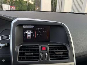 White Volvo XC60 2011 in Vilnius, with an engine capacity of 2.40 L and mileage of 292 thousand km for 9950 €, photo 8 on AUTOMOTO.COM.LV