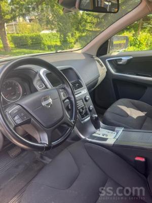 White Volvo XC60 2011 in Riga, with an engine capacity of 2.00 L and mileage of 230 thousand km for 7700 €, photo 5 on AUTOMOTO.COM.LV
