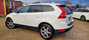 White Volvo XC60 2012 in Riga, with an engine capacity of 2.40 L and mileage of 0 thousand km for 10900 €, photo 4 on AUTOMOTO.COM.LV
