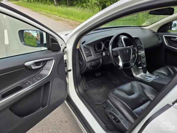 White Volvo XC60 2012 in Kaunas, with an engine capacity of 2.40 L and mileage of 266 thousand km for 8650 €, photo 9 on AUTOMOTO.COM.LV