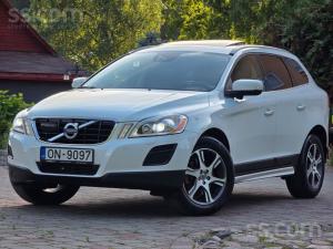 White Volvo XC60 2012 in Riga, with an engine capacity of 2.40 L and mileage of 299 thousand km for 10650 €, photo  on AUTOMOTO.COM.LV