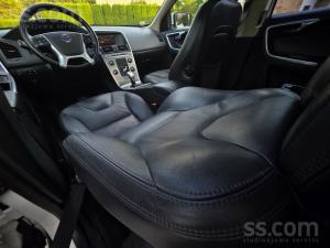 White Volvo XC60 2012 in Riga, with an engine capacity of 2.40 L and mileage of 299 thousand km for 10650 €, photo 22 on AUTOMOTO.COM.LV