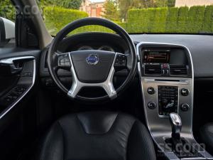 White Volvo XC60 2012 in Riga, with an engine capacity of 2.40 L and mileage of 299 thousand km for 10650 €, photo 24 on AUTOMOTO.COM.LV