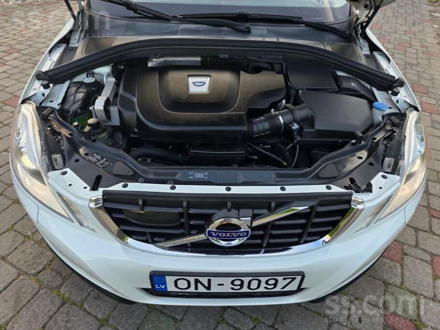 White Volvo XC60 2012 in Riga, with an engine capacity of 2.40 L and mileage of 299 thousand km for 10650 €, photo 30 on AUTOMOTO.COM.LV