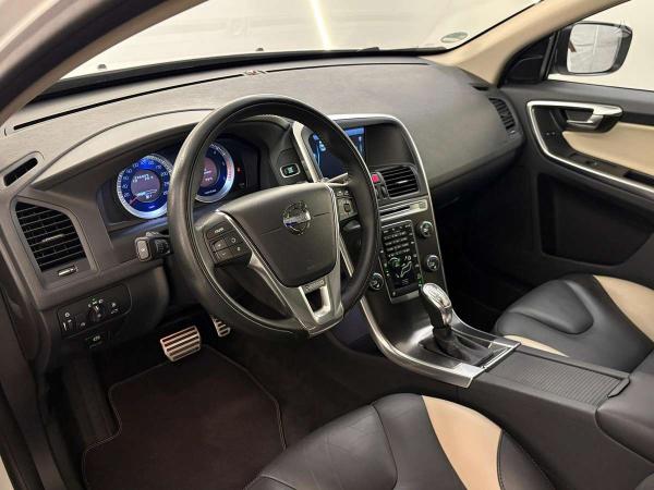 White Volvo XC60 2012 in Marijampole, with an engine capacity of 2.40 L and mileage of 290 thousand km for 10999 €, photo 2 on AUTOMOTO.COM.LV