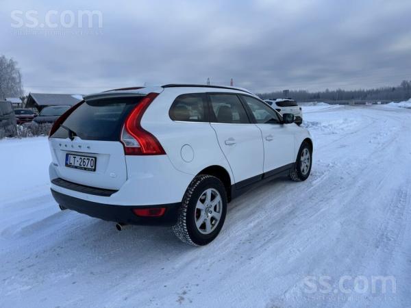 White Volvo XC60 2013 in Talsi, with an engine capacity of 2.40 L and mileage of 0 thousand km for 8470 €, photo 7 on AUTOMOTO.COM.LV