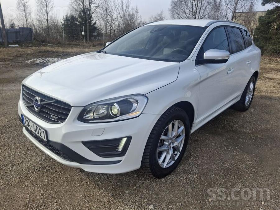White Volvo XC60 2013 in Riga, with an engine capacity of 2.00 L and mileage of 256 thousand km for 10650 €, photo 1 on AUTOMOTO.COM.LV