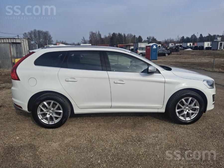 White Volvo XC60 2013 in Riga, with an engine capacity of 2.00 L and mileage of 256 thousand km for 10650 €, photo 7 on AUTOMOTO.COM.LV