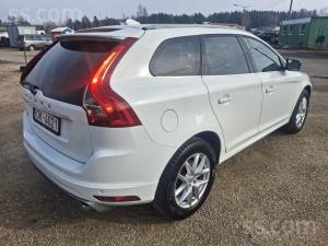 White Volvo XC60 2013 in Riga, with an engine capacity of 2.00 L and mileage of 256 thousand km for 10650 €, photo 8 on AUTOMOTO.COM.LV