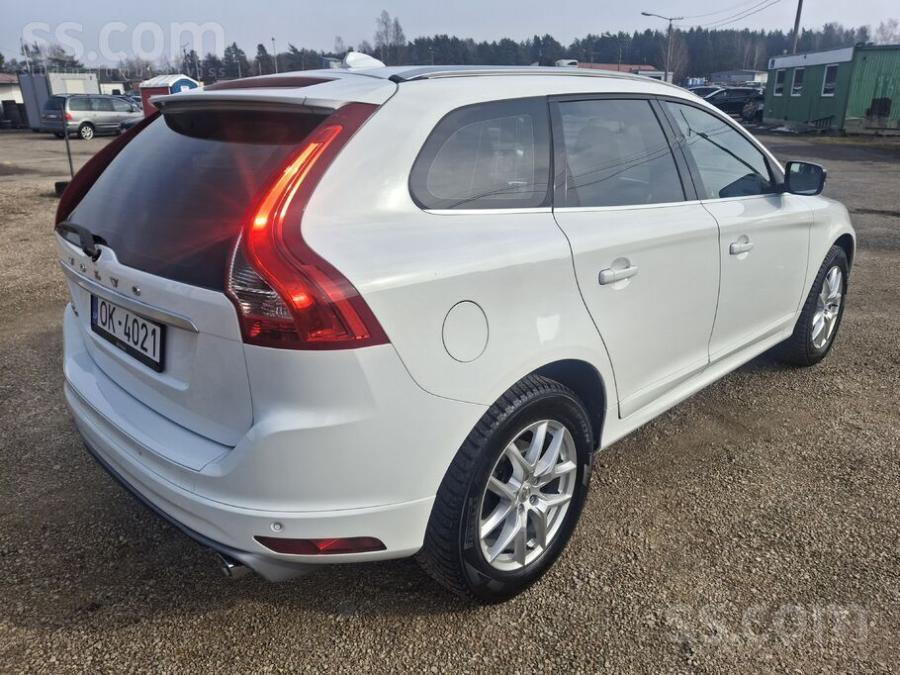 White Volvo XC60 2013 in Riga, with an engine capacity of 2.00 L and mileage of 256 thousand km for 10650 €, photo 8 on AUTOMOTO.COM.LV