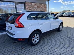 White Volvo XC60 2013 in Talsi, with an engine capacity of 2.40 L and mileage of 0 thousand km for 8470 €, photo 6 on AUTOMOTO.COM.LV