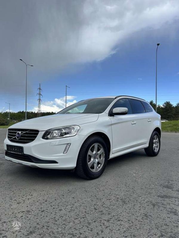 White Volvo XC60 2013 in Kaunas, with an engine capacity of 1.97 L and mileage of 257 thousand km for 6650 €, photo 6 on AUTOMOTO.COM.LV