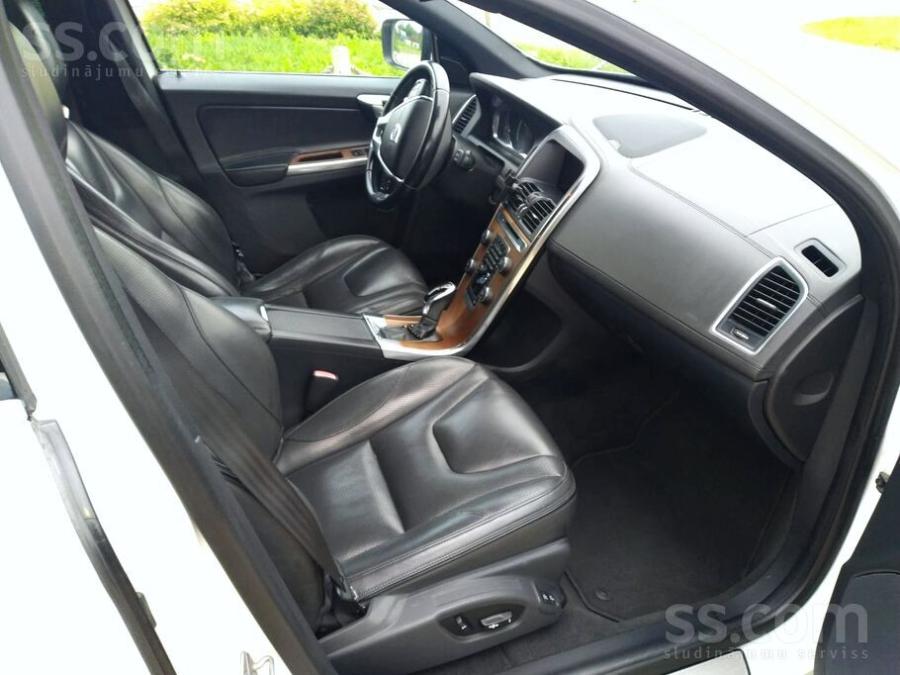White Volvo XC60 2013 in Riga, with an engine capacity of 2.40 L and mileage of 288 thousand km for 13300 €, photo 7 on AUTOMOTO.COM.LV