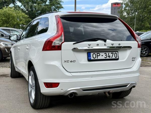 White Volvo XC60 2013 in Riga, with an engine capacity of 2.40 L and mileage of 0 thousand km for 9500 €, photo 3 on AUTOMOTO.COM.LV