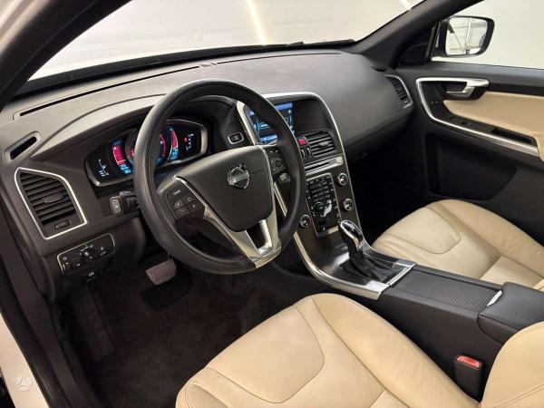 White Volvo XC60 2013 in Marijampole, with an engine capacity of 2.40 L and mileage of 284 thousand km for 12750 €, photo 2 on AUTOMOTO.COM.LV