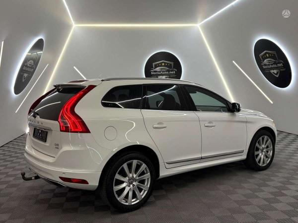 White Volvo XC60 2013 in Marijampole, with an engine capacity of 2.40 L and mileage of 284 thousand km for 12750 €, photo 5 on AUTOMOTO.COM.LV