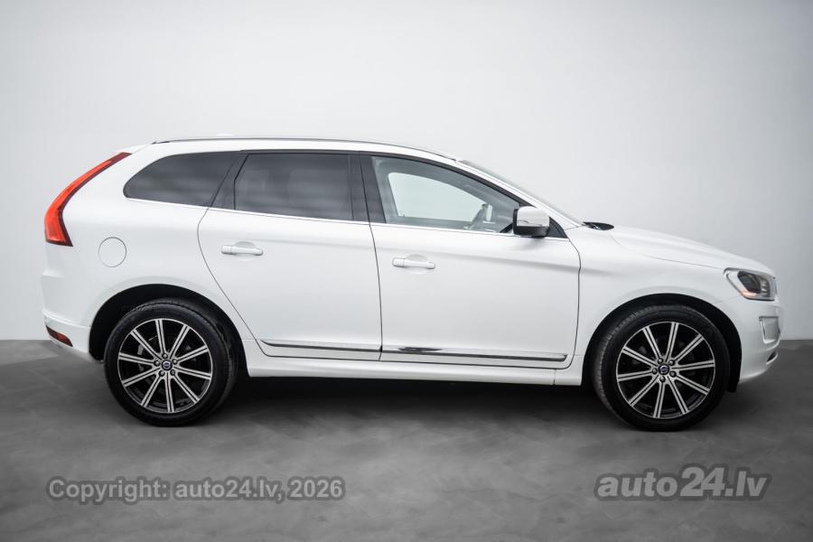 White Volvo XC60 2013 in Tallinn, with an engine capacity of 2.40 L and mileage of 199 thousand km for 14999 €, photo 5 on AUTOMOTO.COM.LV