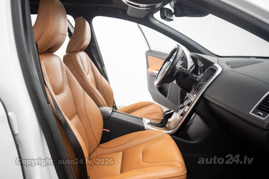 White Volvo XC60 2013 in Tallinn, with an engine capacity of 2.40 L and mileage of 199 thousand km for 14999 €, photo 12 on AUTOMOTO.COM.LV