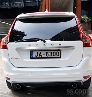 White Volvo XC60 2013 in Riga, with an engine capacity of 2.40 L and mileage of 235 thousand km for 13950 €, photo 6 on AUTOMOTO.COM.LV