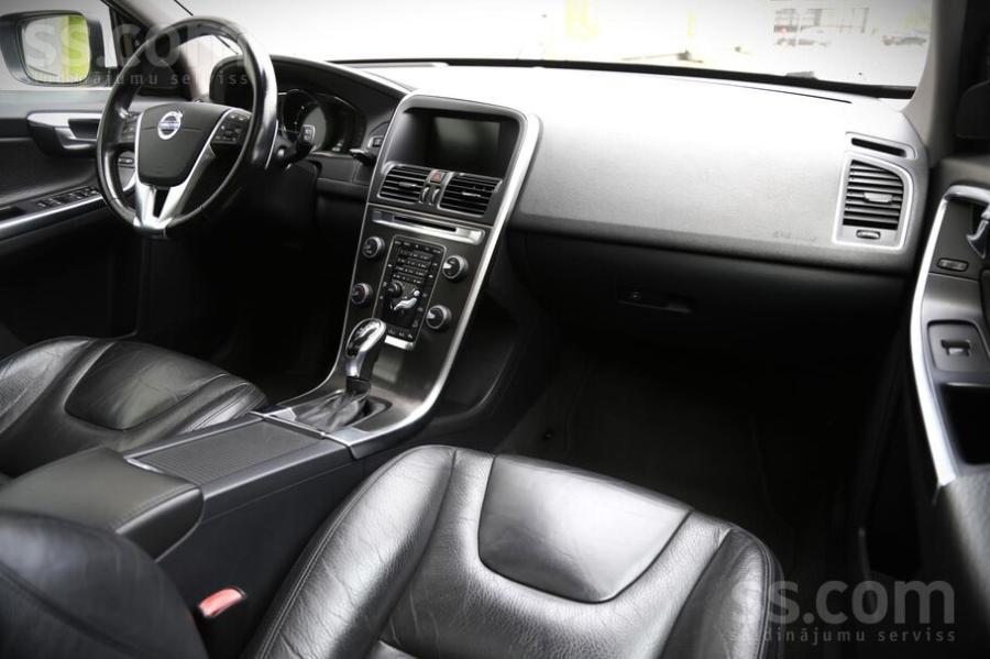 White Volvo XC60 2013 in Riga, with an engine capacity of 2.40 L and mileage of 166 thousand km for 10995 €, photo 12 on AUTOMOTO.COM.LV