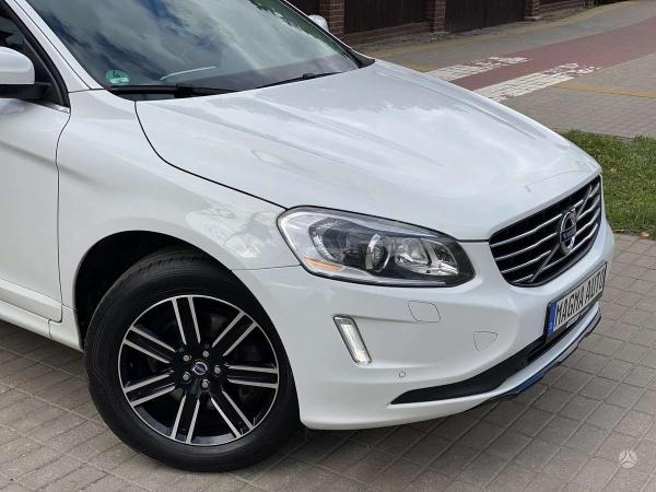 White Volvo XC60 2013 in Marijampole, with an engine capacity of 2.40 L and mileage of 339 thousand km for 11450 €, photo 9 on AUTOMOTO.COM.LV