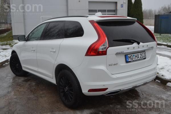 White Volvo XC60 2014 in Riga, with an engine capacity of 2.40 L and mileage of 0 thousand km for 12950 €, photo 4 on AUTOMOTO.COM.LV