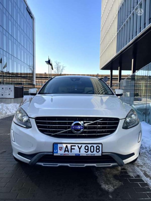 White Volvo XC60 2014 in Vilnius, with an engine capacity of 1.98 L and mileage of 315 thousand km for 8999 €, photo 3 on AUTOMOTO.COM.LV