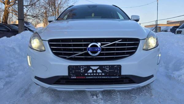 White Volvo XC60 2014 in Siauliai, with an engine capacity of 2.40 L and mileage of 290 thousand km for 12750 €, photo 8 on AUTOMOTO.COM.LV