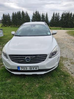 White Volvo XC60 2014 in Tallinn, with an engine capacity of 2.40 L and mileage of 380 thousand km for 6500 €, photo 4 on AUTOMOTO.COM.LV