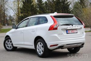 White Volvo XC60 2014 in Riga, with an engine capacity of 2.40 L and mileage of 237 thousand km for 11590 €, photo 4 on AUTOMOTO.COM.LV