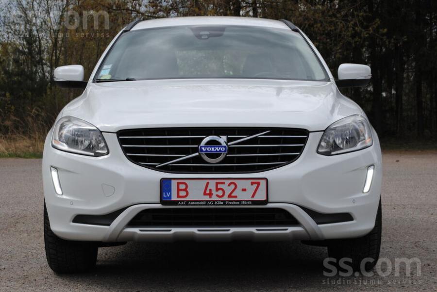 White Volvo XC60 2014 in Riga, with an engine capacity of 2.40 L and mileage of 237 thousand km for 11590 €, photo 6 on AUTOMOTO.COM.LV