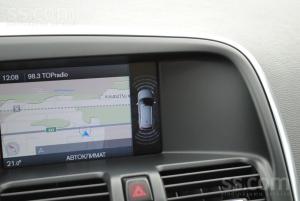 White Volvo XC60 2014 in Riga, with an engine capacity of 2.40 L and mileage of 237 thousand km for 11590 €, photo 29 on AUTOMOTO.COM.LV