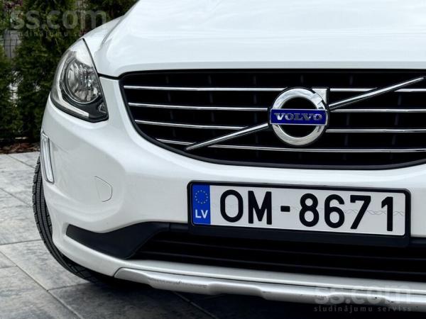 White Volvo XC60 2014 in Jelgava, with an engine capacity of 2.00 L and mileage of 173 thousand km for 13800 €, photo 4 on AUTOMOTO.COM.LV
