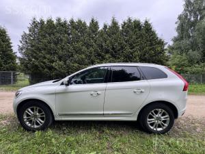 Balts Volvo XC60 2014 Rīga, ar dzinēja tilpumu 2.40 L un nobraukumu 226 tūkst. km par 11950 €, foto 4 vietnē AUTOMOTO.COM.LV