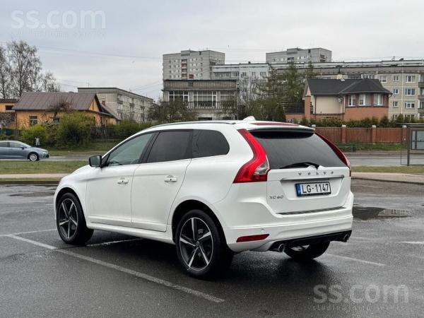White Volvo XC60 2014 in Riga, with an engine capacity of 2.40 L and mileage of 301 thousand km for 14600 €, photo 3 on AUTOMOTO.COM.LV