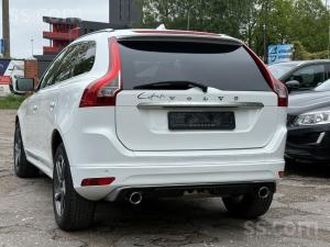 White Volvo XC60 2014 in Riga, with an engine capacity of 2.40 L and mileage of 0 thousand km for 13300 €, photo 4 on AUTOMOTO.COM.LV