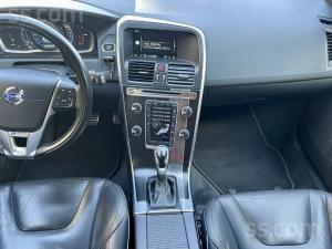 White Volvo XC60 2014 in Riga, with an engine capacity of 2.40 L and mileage of 0 thousand km for 13300 €, photo 10 on AUTOMOTO.COM.LV