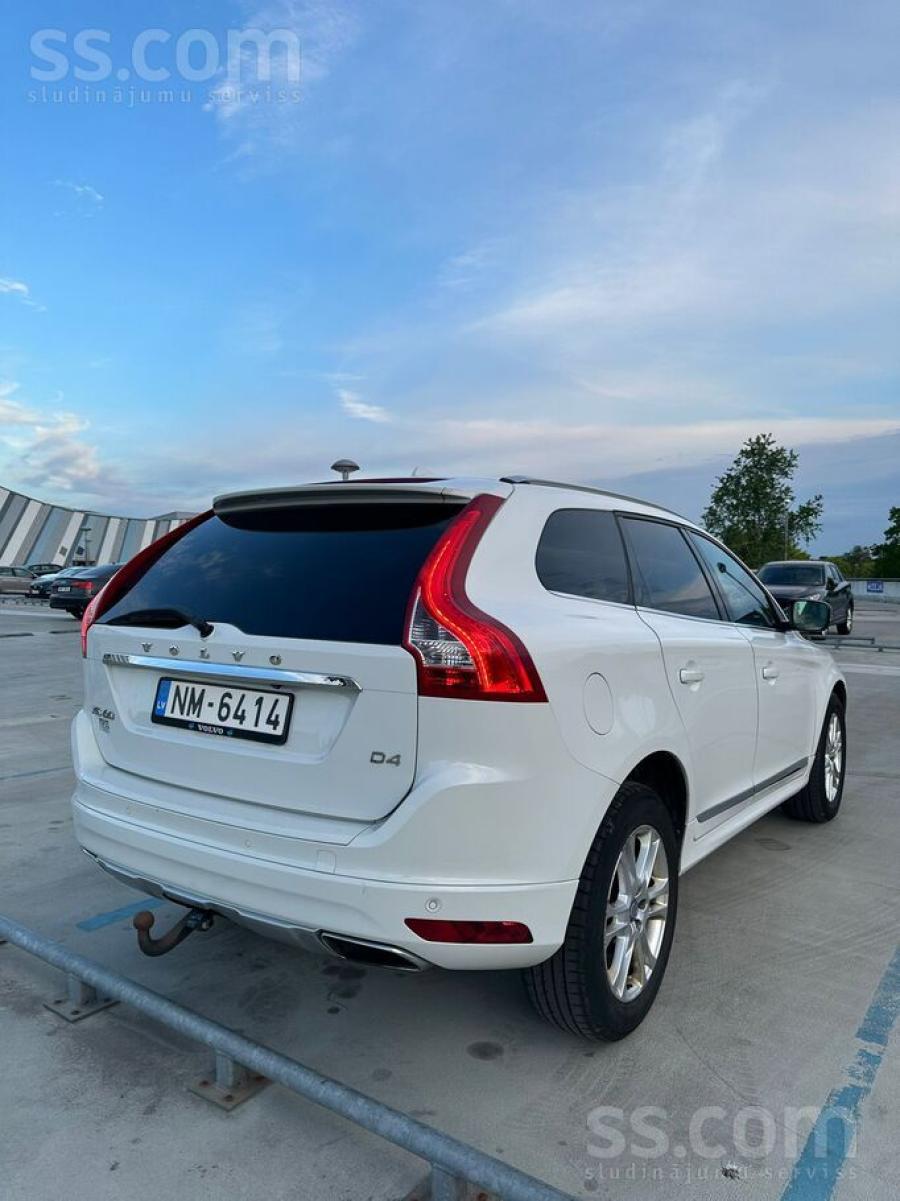 White Volvo XC60 2014 in Riga, with an engine capacity of 2.00 L and mileage of 170 thousand km for 9500 €, photo 5 on AUTOMOTO.COM.LV