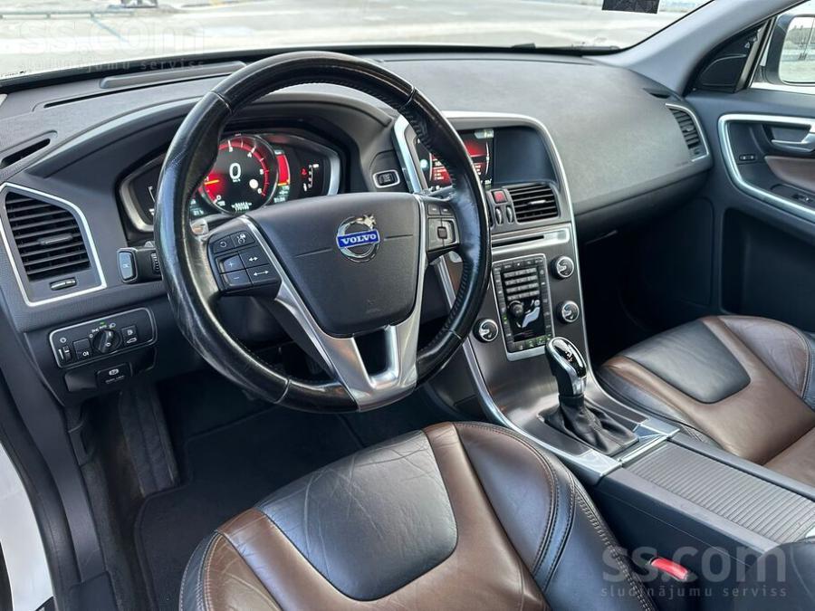 White Volvo XC60 2014 in Riga, with an engine capacity of 2.00 L and mileage of 170 thousand km for 9500 €, photo 7 on AUTOMOTO.COM.LV